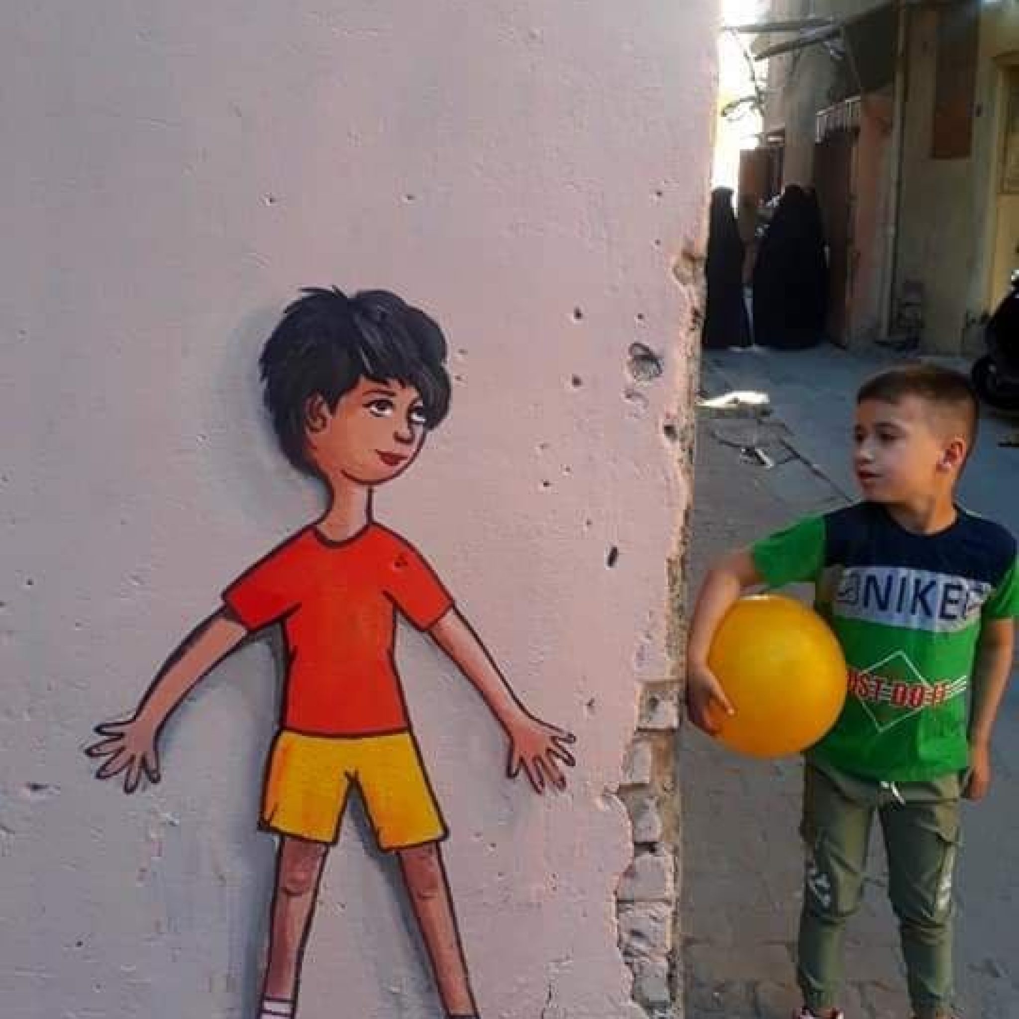 Butterfly Effect: Iraqi Painters Transform Baghdad Into an Open-Air Gallery